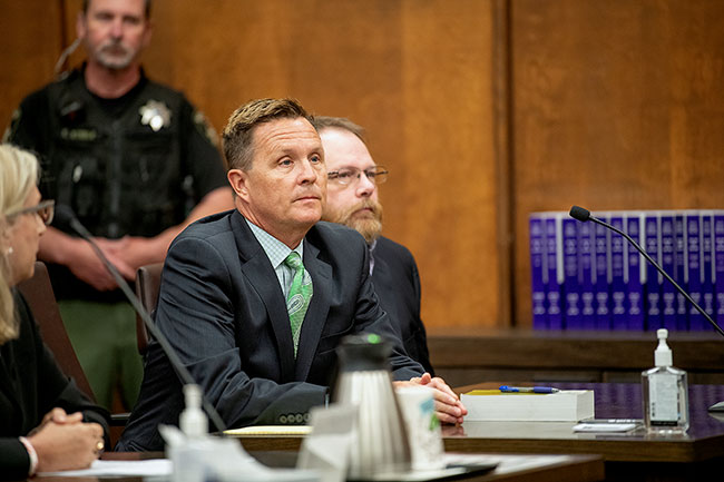 Wolfe pleads guilty to murdering woman, son