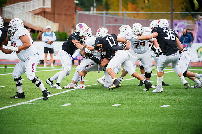 Linfield dominates, improves to 8-0