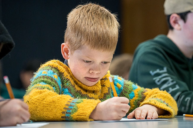 Connecting with cursive: Youngsters learn to follow their own script
