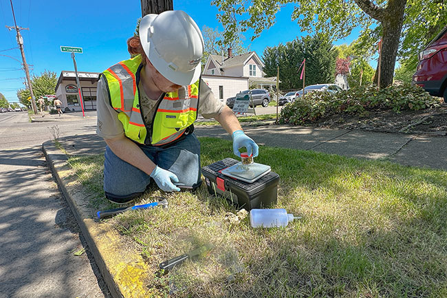 Flags mark planned curb ramp project