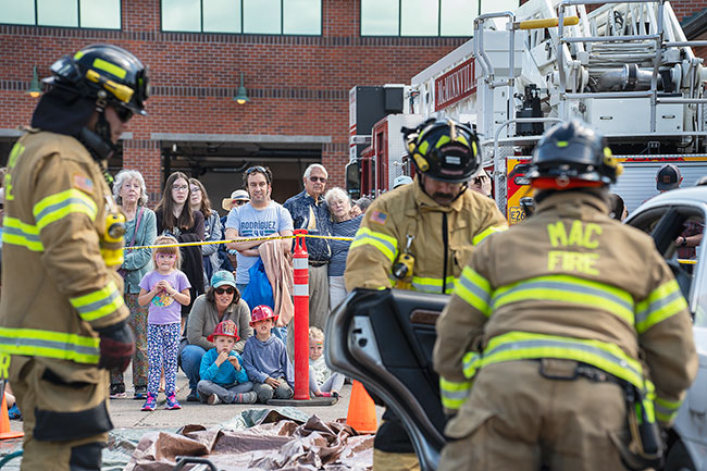 Firefighters demonstrate extrication tools Sunday as Mac Fire ...
